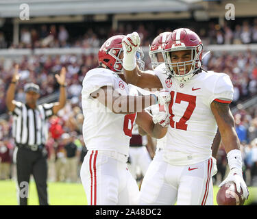 Alabama wide receiver Jaylen Waddle (17) carries the ball against ...