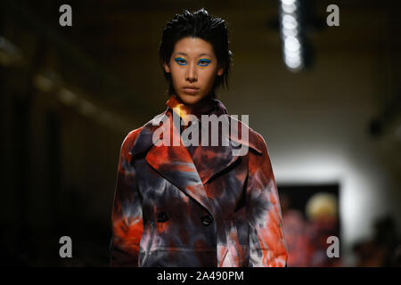 A model walks the runway during Ricardo Andrez fashion show at ...