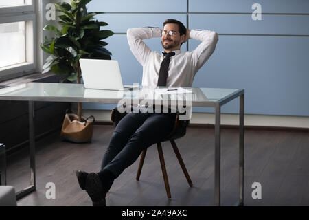 Young male businessman enjoying his time during vacation Stock Photo ...