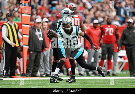 Carolina Panthers' Javien Elliott reacts to an interception during the ...