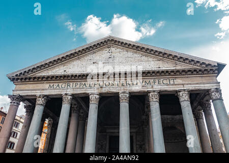The iconic facade of the Pantheon historic building with its tall Stock ...