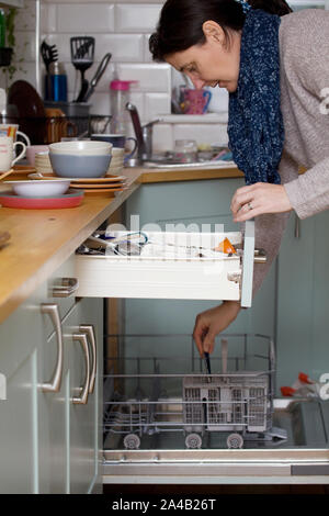 Open empty drawers in kitchen, closeup Stock Photo - Alamy