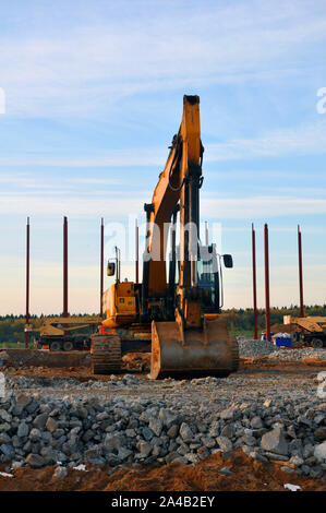 Construction machine (excavator) on the background construction site ...