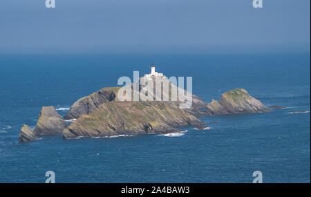 Muckle Flugga lighthouse off Unst in the Shetland Islands Stock Photo ...