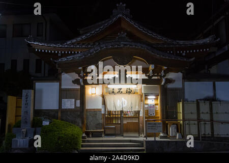 The traditional entrance to one of the older hotspring baths in Bessho ...