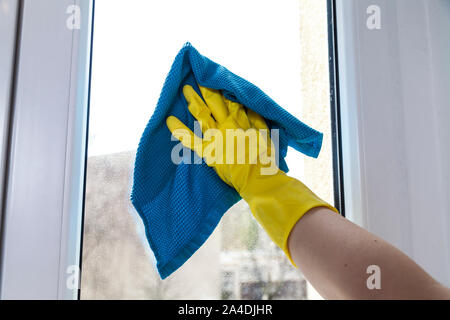 Cleaning window in spring time Stock Photo - Alamy