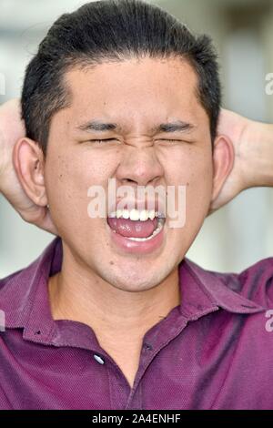 Handsome Filipino Male Shouting Stock Photo - Alamy