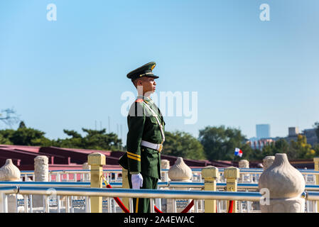 Security Guard Standing In Front Of Gate Stock Photo - Alamy
