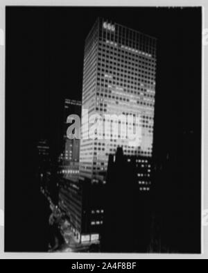 Tishman building, 666 5th Ave., New York City. Night view of building ...