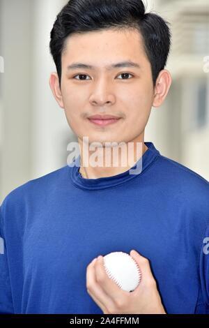 An Unemotional Filipino Male Athlete Stock Photo - Alamy