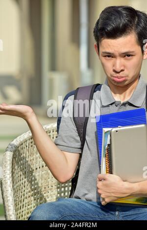 An Undecided Boy Student Stock Photo - Alamy