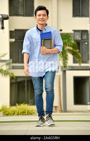 Filipino Boy Student Smiling Walking Stock Photo - Alamy