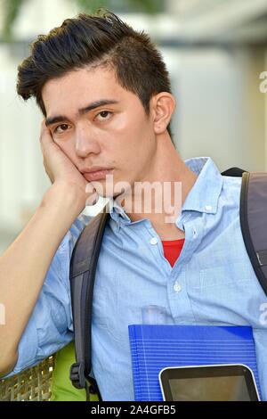 Sad Filipino Male Stock Photo - Alamy