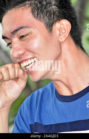Young Filipino Male And Laughter Stock Photo - Alamy