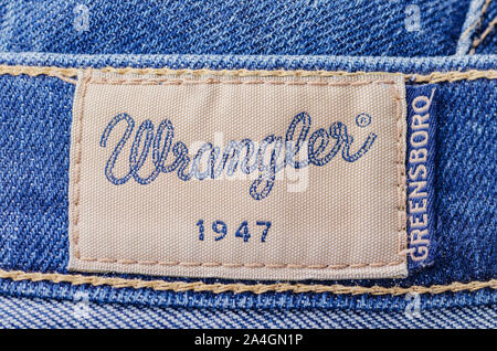 Closeup of Wrangler label on blue jeans Stock Photo - Alamy