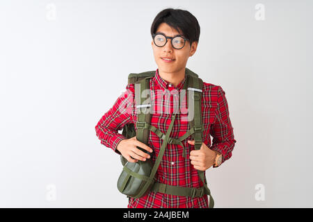 Chinese hiker man wearing backpack canteen glasses over isolated white ...