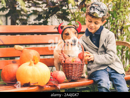 Trick or Treat. happy child wearing skeleton costume on Halloween at ...