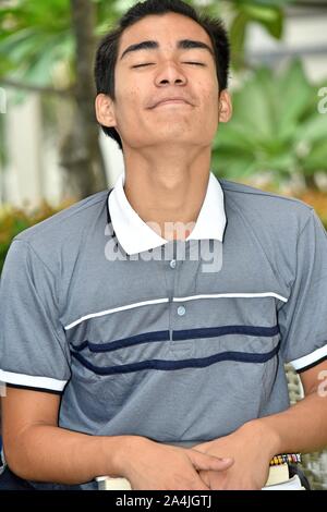 Diverse Male Student Wondering Stock Photo - Alamy