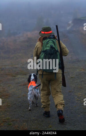 Hunter with rifles and hunting dog, shotgun, Spain Stock Photo - Alamy