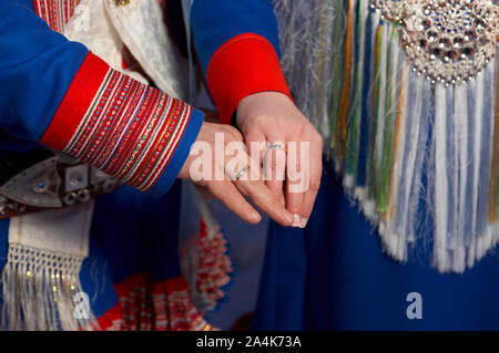 Laplander traditional costume. Laplander wedding. Bride getting dressed ...
