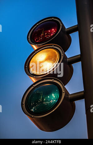 Traffic signal, orange light, amber light, or traffic light. Blue Stock ...