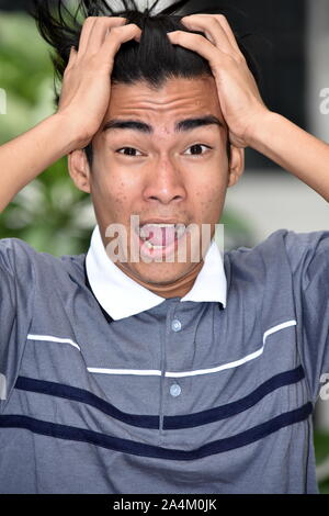 Stressed Young Filipino Adult Male Stock Photo - Alamy