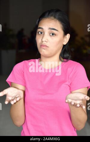 An Indecisive Attractive Diverse Person Stock Photo - Alamy