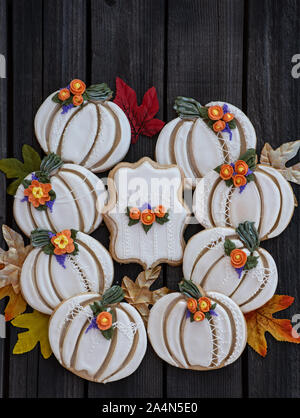 Fall pumpkin cookies decorated with royal icing Stock Photo - Alamy