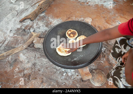 Traditional African food Diphaphatha fresh rolls, cooked outdoors in ...