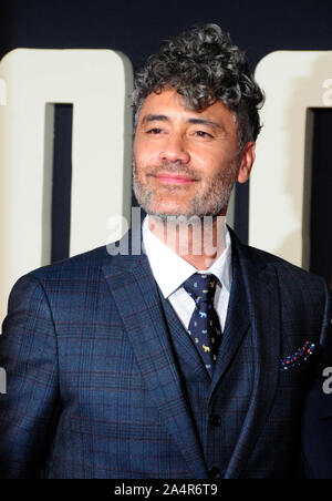 Director-writer-producer Taika Waititi, left, actress Leslie Bibb and ...