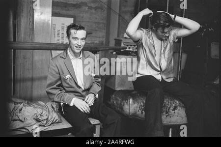 Elvis Presley and his cousin Gene Smith on a bus travelling on tour ...