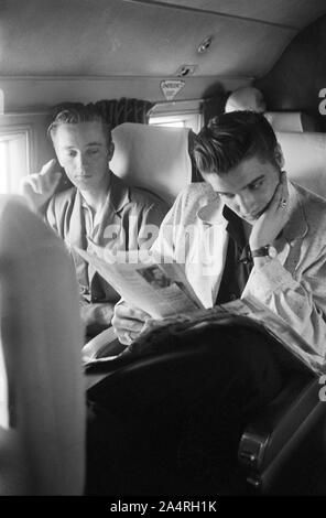 Elvis Presley and his cousin Gene Smith, backstage at the University of ...
