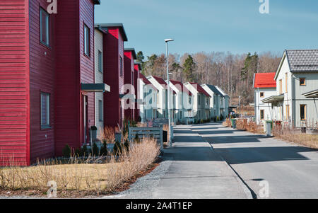 Street of typical suburban Swedish houses in the Stockholm suburb of ...