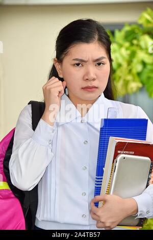 Mad Female Student With Notebooks Stock Photo - Alamy