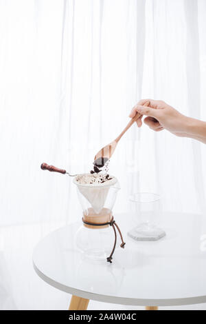 Man spills coffee powder to Drip Coffee Stock Photo - Alamy