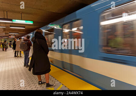 A Montreal Metro subway train in motion, in Montreal, Quebec. The metro ...