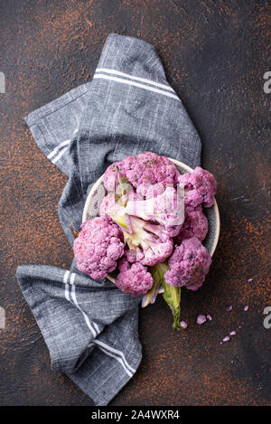 Raw ripe dissected purple cauliflower Stock Photo - Alamy