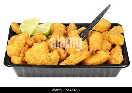 Kibbeling in a plastic tray isolated on white background. Kibbeling is ...