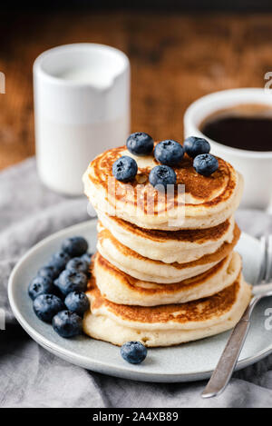 Appetizing breakfast with orange juice, tea, fruits, berries ...