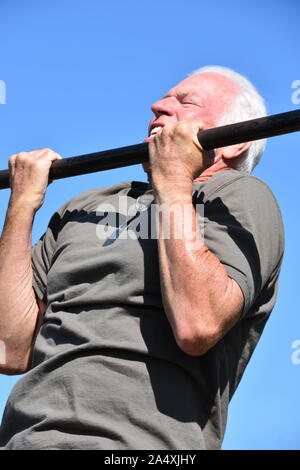Male Veteran And Muscles Exercising Stock Photo - Alamy