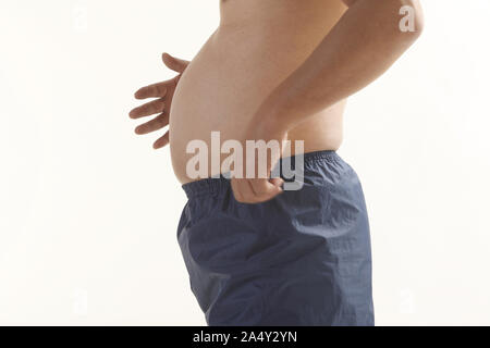 fat man belly. close up shot of fat, obese, overweight dad bod stomach ...