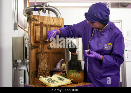 Cadbury World chocolatier Dawn Jenks adds the finishing touches to the ...
