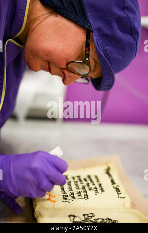 Cadbury World chocolatier Dawn Jenks adds the finishing touches to the ...