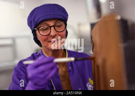Cadbury World chocolatier Dawn Jenks adds the finishing touches to the ...