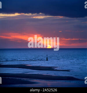 Sunset over beach, sea, Normandy, France Stock Photo - Alamy