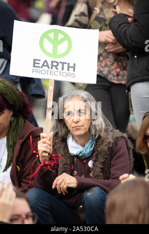 A woman seen holding a placard in support of Africa during the rally ...
