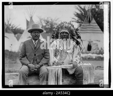Two native American men, one in traditional dress Stock Photo - Alamy