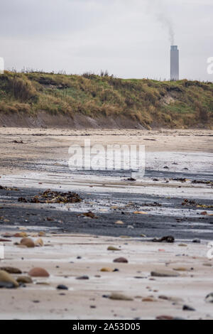 Sea coal on the beach at Newbiggin by the Sea, Northumberland, England ...