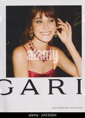 poster advertising BVLGARI Roma fashion house with Carla Bruni in paper ...