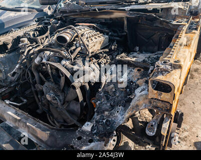A burnt car engine with propeller after a fire or an accident in a ...
